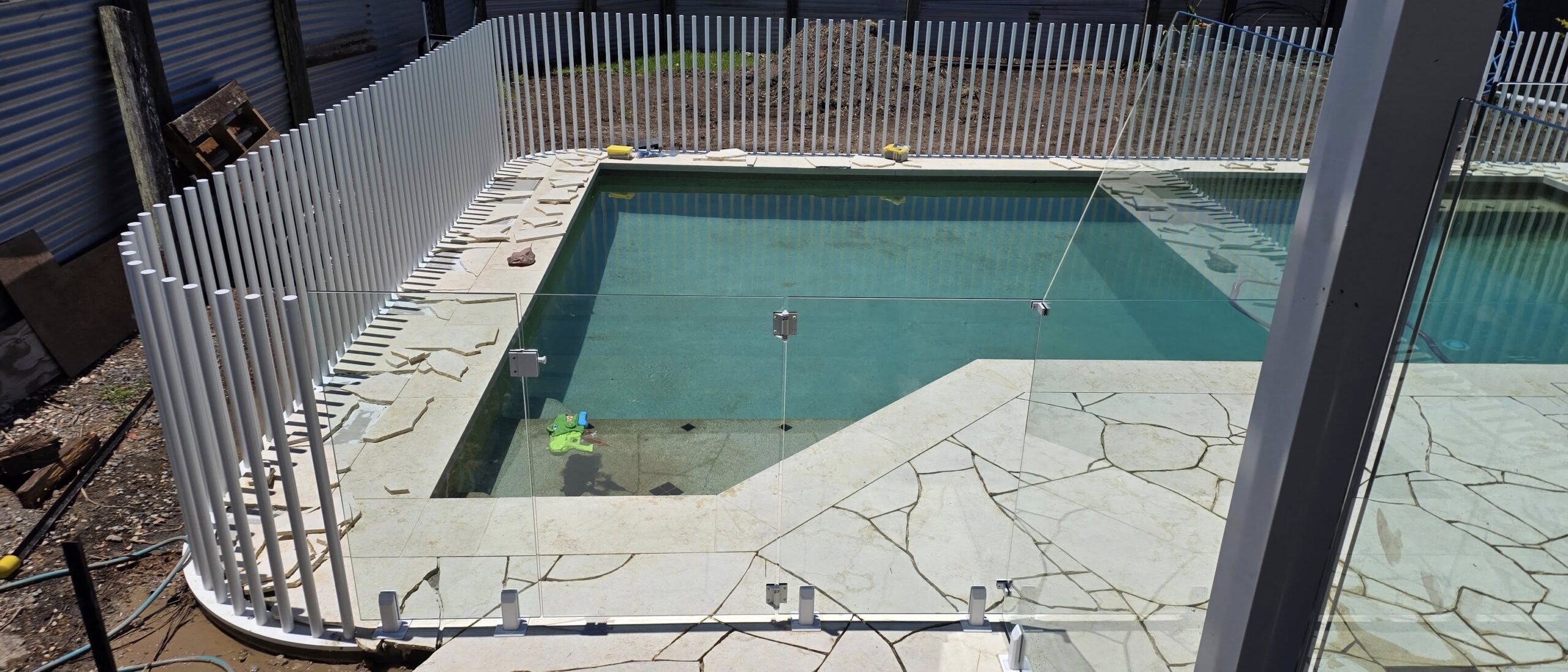 Custom raked glass with our frameless pool fence gate - one more job ...